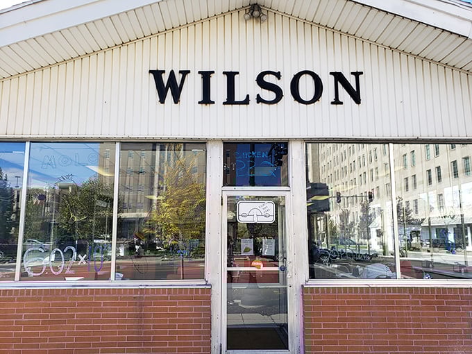 No frills, no fuss, just a simple white building where burger magic happens one smashed patty at a time.