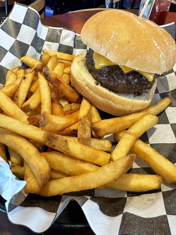 This isn't just a cheeseburger—it's a monument to beef perfection. That melty American cheese blanket is tucking in a patty ready for its close-up.