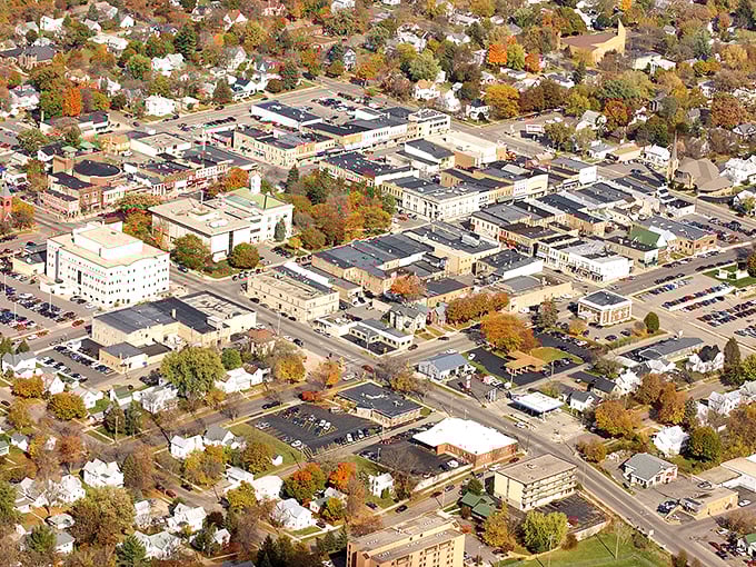 Baraboo from above reveals its perfect small-town geometry—a place where you can actually walk to dinner without consulting GPS or requiring an emergency rescue.