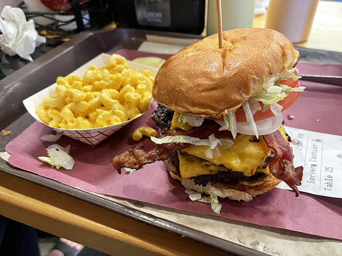 The Arch D-Lux doesn't just satisfy hunger—it conquers it. This towering achievement of beef, cheese, and toppings makes the Gateway Arch seem like the second most impressive structure in St. Louis.
