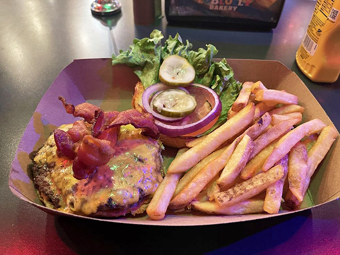 This bacon cheeseburger with fries isn't just a meal, it's a masterclass in why simple food done right trumps fancy cuisine every time. 