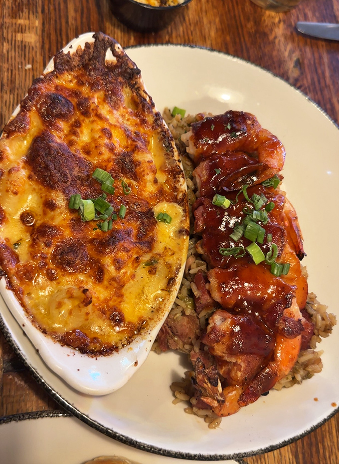 Louisiana's perfect marriage: creamy mac and cheese meets BBQ shrimp. Like finding your soulmate on a plate—rich, complex, and worth every calorie.