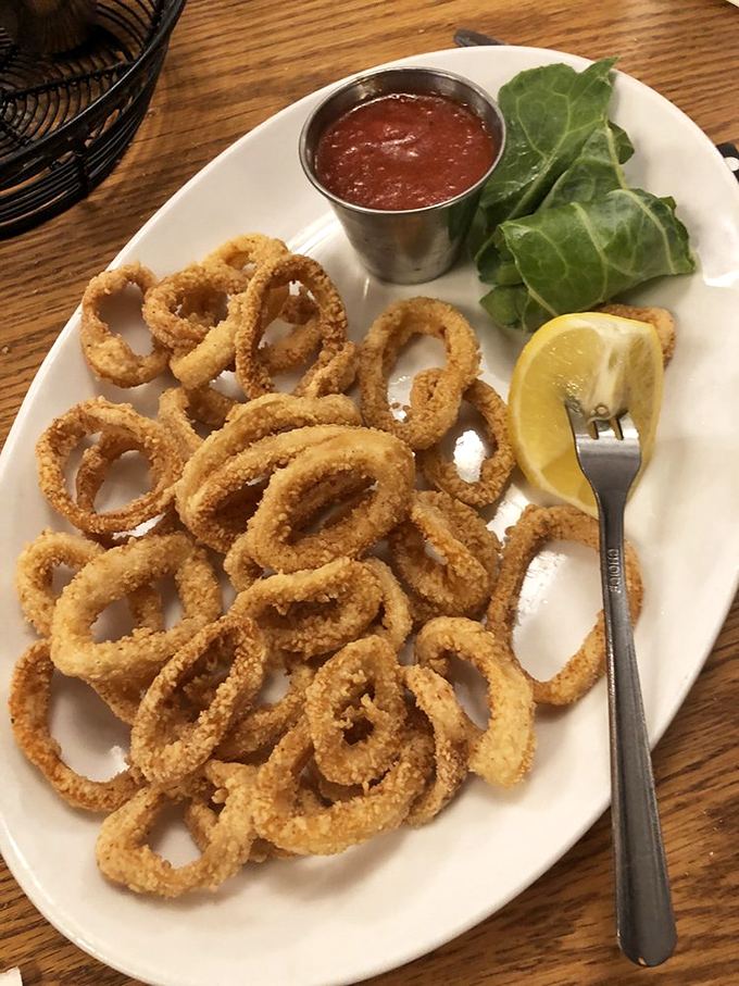 These golden calamari rings aren't just appetizers—they're crispy halos of deliciousness that make waiting for your steak a pleasure rather than a chore.