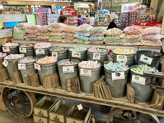 Childhood memories sold by the pound. These galvanized buckets don't just hold candy—they contain pure, crystallized joy in every pastel color imaginable.