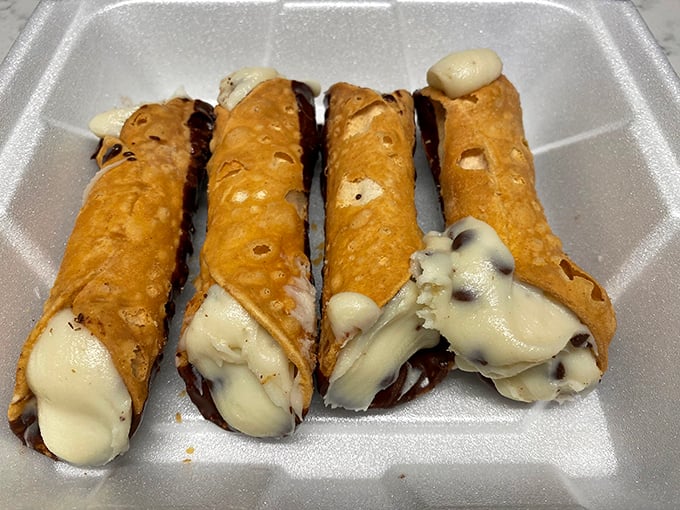 The holy grail of Italian pastry: cannoli with perfectly crisp shells giving way to creamy, sweet filling. These aren't just desserts—they're edible happiness at $2 a pop. 