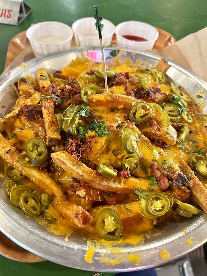 Cheese Fries "Surprise" that would make a cardiologist wince and a foodie weep. The surprise? You'll still want more after finishing the whole plate.