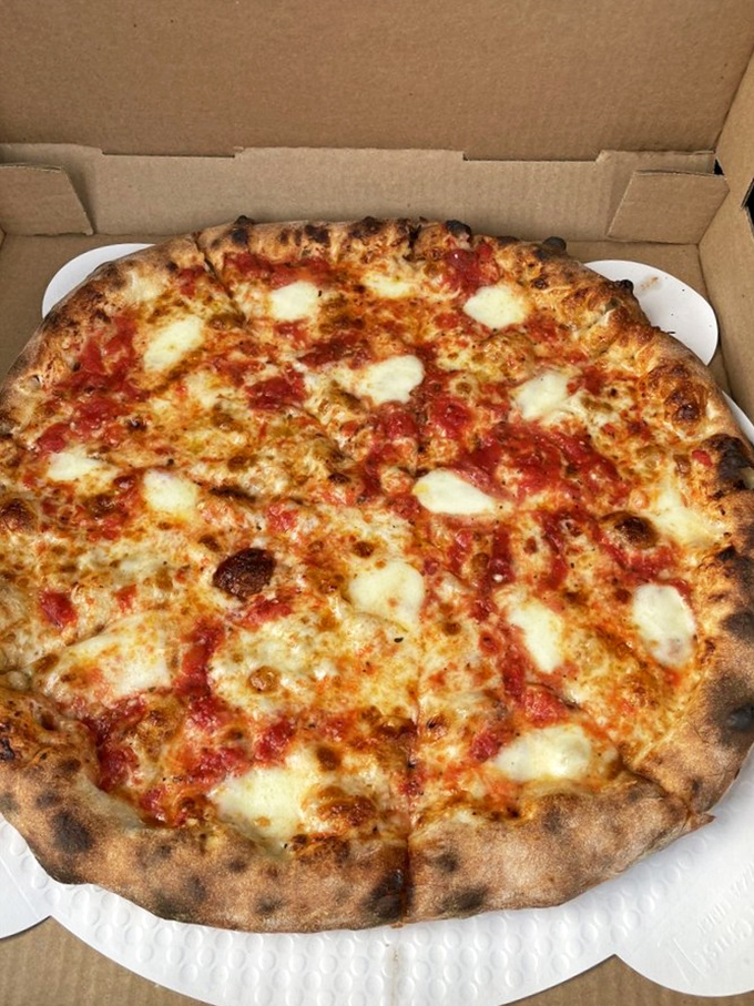 Beauty in simplicity. The blistered crust and perfect cheese-to-sauce ratio prove that sometimes the classics need no improvement.