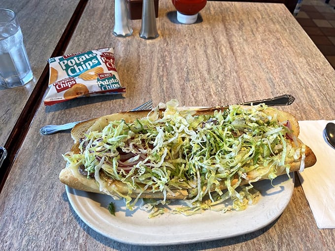 This isn't just a cheesesteak—it's a Philadelphia handshake in sandwich form, bursting with fresh ingredients and zero apologies for its magnificent messiness.