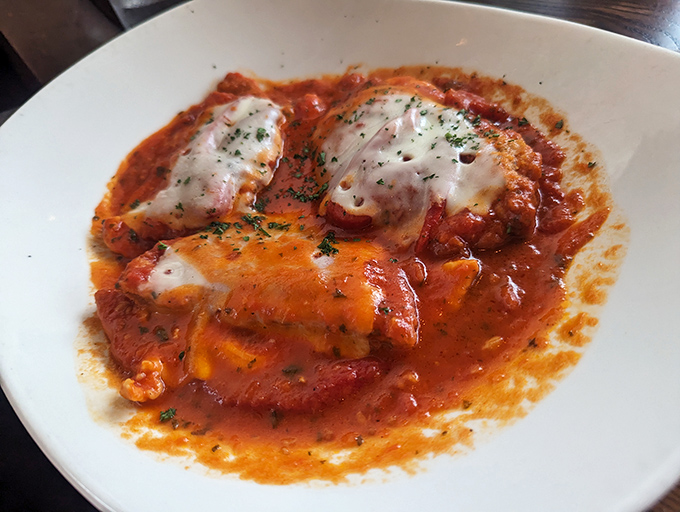 Behold, the star of our show—chicken parmesan that makes you want to write love songs and possibly rename your firstborn "Parm."