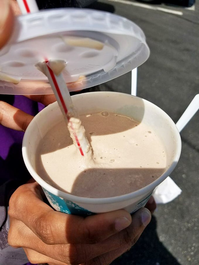 A chocolate malt so thick the straw stands at attention. This isn't a drink—it's a commitment, a relationship, possibly a lifestyle choice.