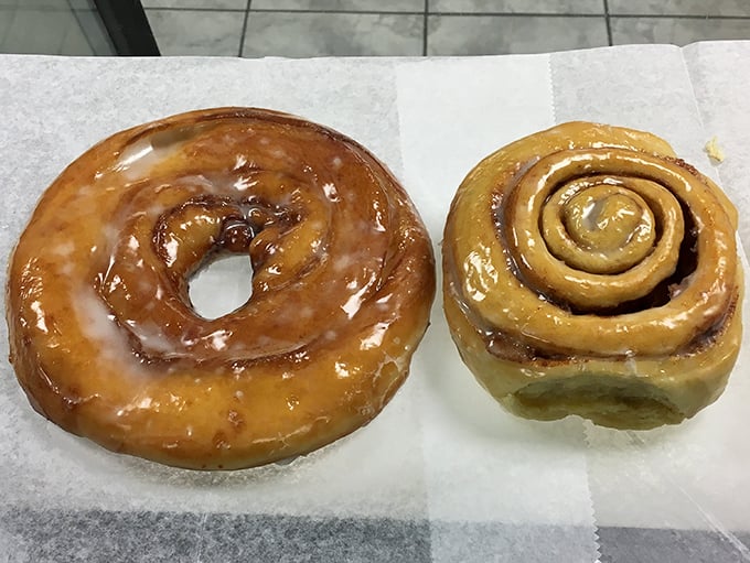 Classic glazed and cinnamon roll side by side – like seeing The Beatles and The Rolling Stones sharing the same stage. Pastry perfection in stereo.