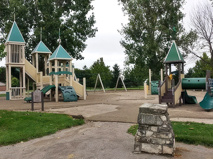 Playground equipment standing at attention, ready for tiny commanders to scale its towers and conquer its slides—childhood adventures in the heart of Delphos.