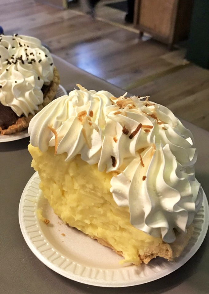 The coconut cream pie doesn't whisper sweet nothings—it shouts them from a mountain of whipped cream and toasted coconut flakes. Diet plans, beware.
