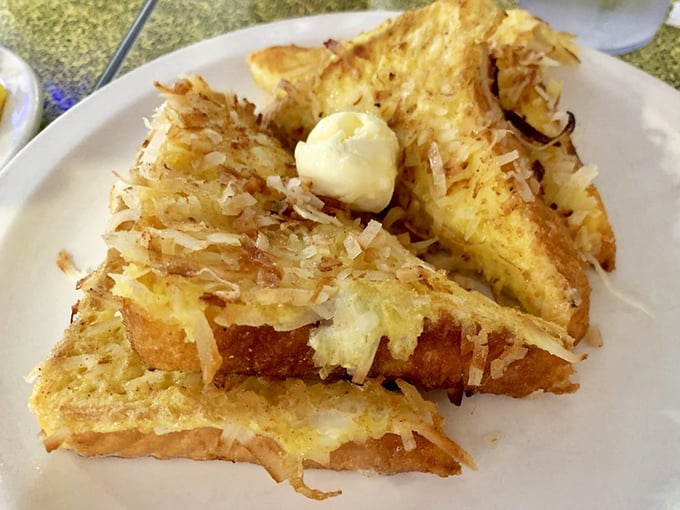 Coconut French toast that makes you question why regular toast even exists. That golden crunch deserves its own theme music.