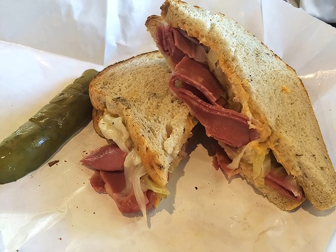 Behold the architectural marvel that is Mitchell's Reuben—layers of corned beef, sauerkraut, and melted Swiss creating perfect harmony between two slices of rye.