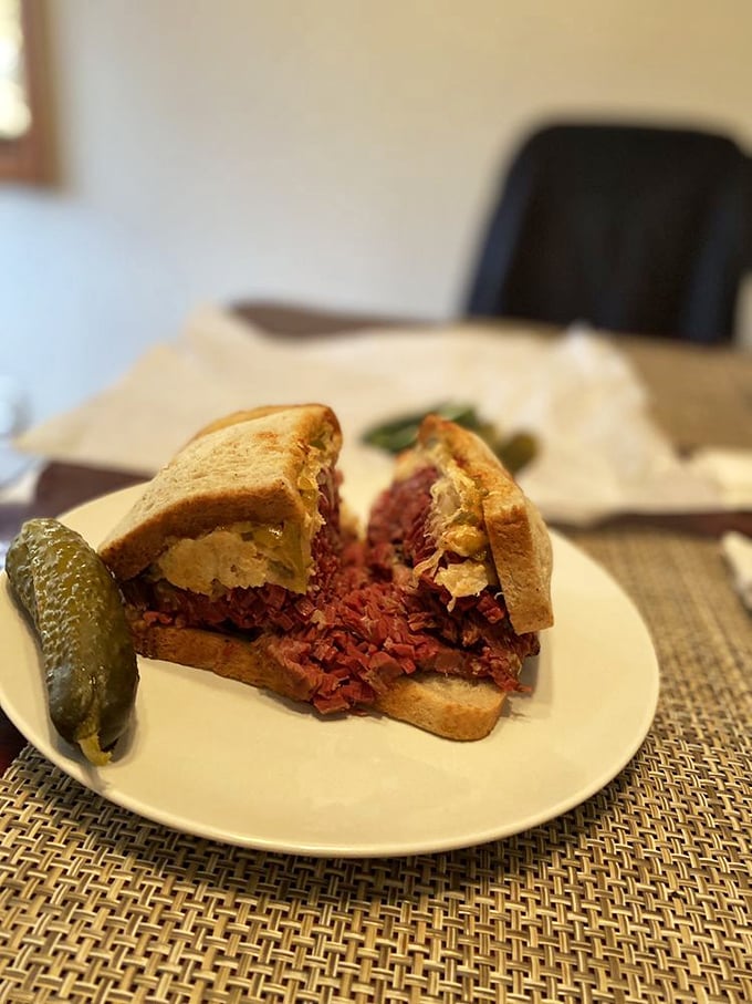 The corned beef sandwich sits there like a meaty monument to patience, each slice hand-carved by someone who's turned sandwich-making into an art form.