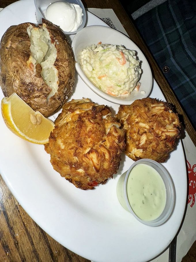 The holy grail of crab cakes—golden-brown perfection with barely enough binding to hold together chunks of sweet crabmeat that practically sing with freshness.