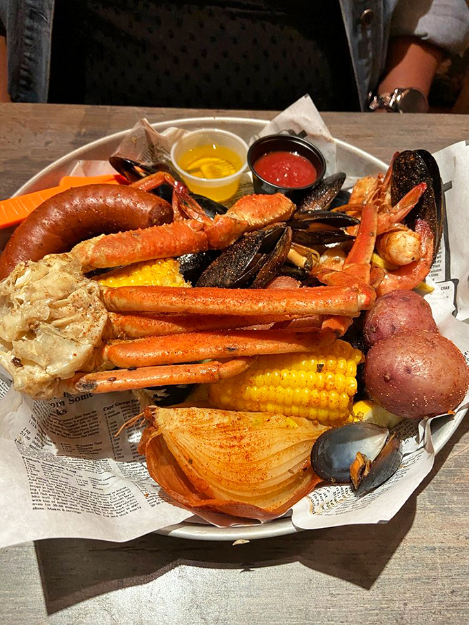 The seafood boil that launched a thousand bibs. Crab legs, shrimp, corn, potatoes, and sausage – a glorious mess worth making.