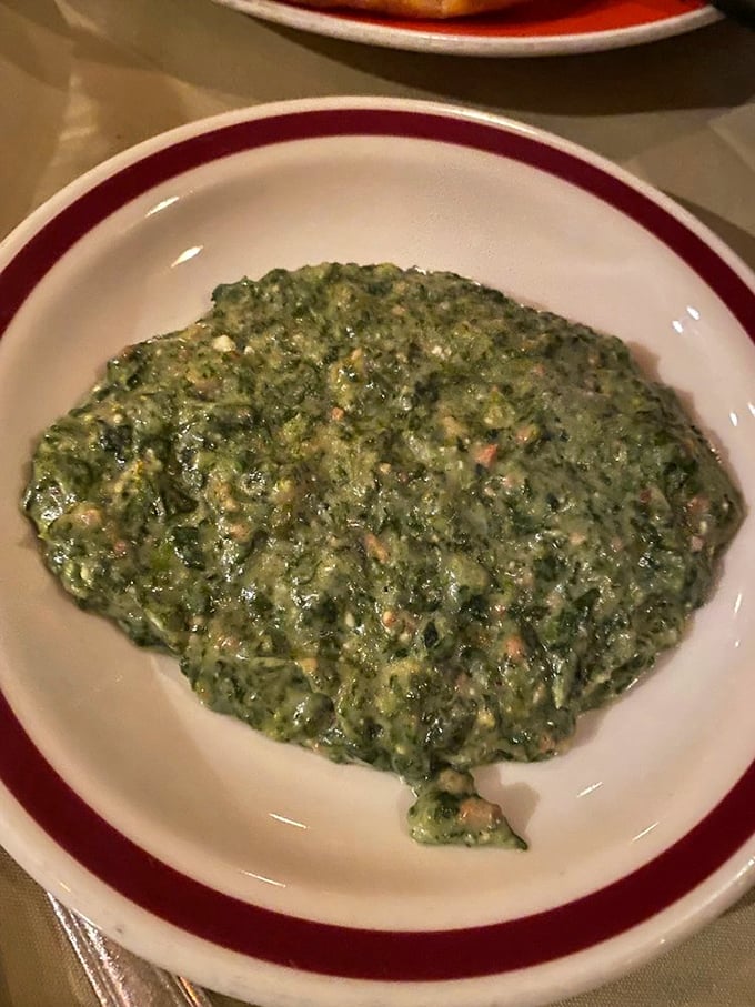 Creamed spinach that Popeye would approve of—silky, rich, and somehow making you feel virtuous while consuming a day's worth of cream.