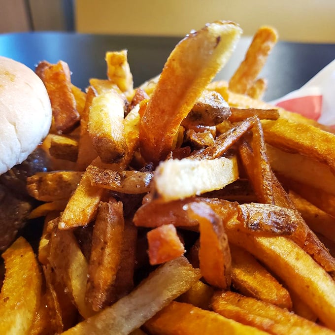 These aren't just fries—they're edible gold bars with a crispy exterior that shatters like thin ice on a Wisconsin lake in early spring.