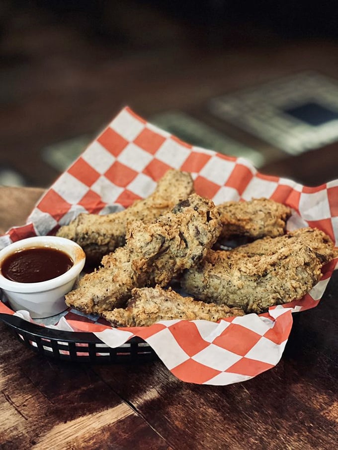 These aren't your average appetizers. Crispy, herb-crusted delights with dipping sauce that'll have you contemplating a second order before finishing the first.