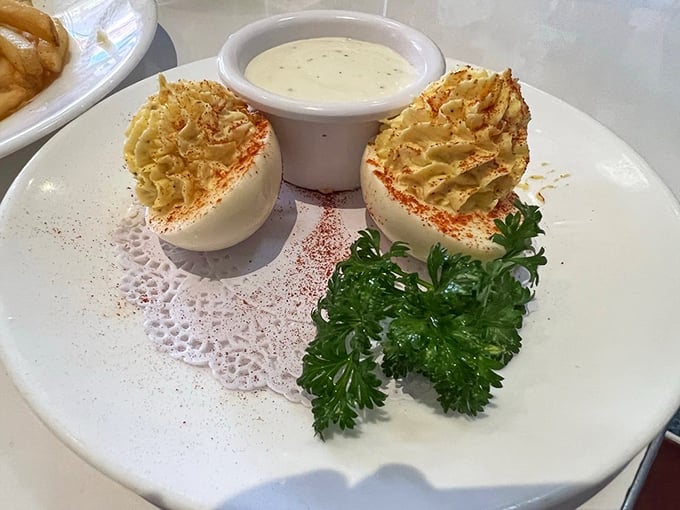 Deviled eggs elevated to an art form. Who knew nostalgia could be so perfectly piped and delicately dusted?