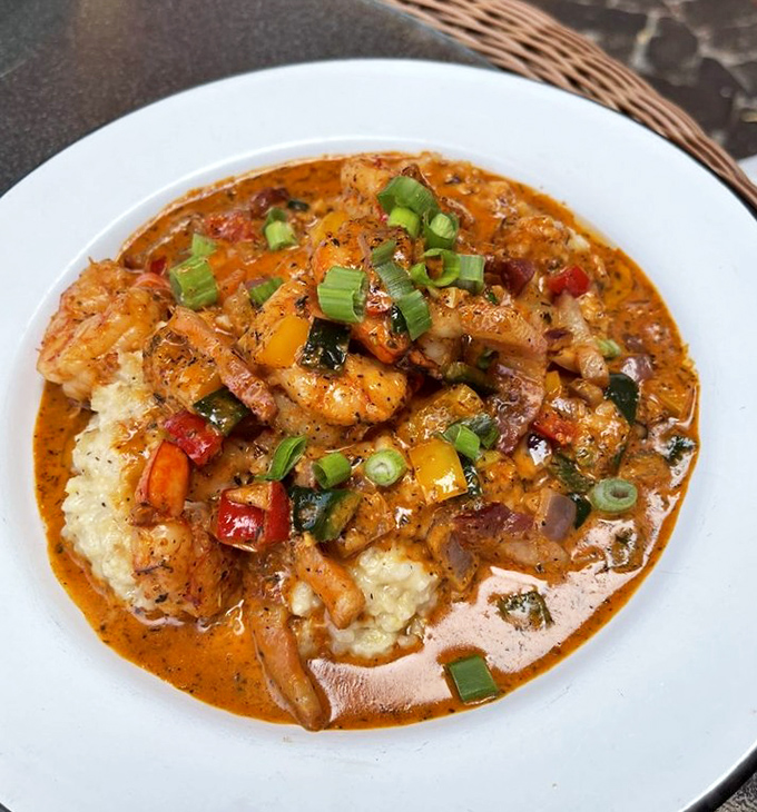 These aren't your grandmother's grits – unless your grandmother was a culinary genius who knew how to make shrimp dance in pepper sauce.
