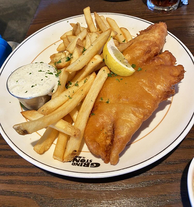 Fish and chips that would make the British jealous – golden, crispy batter hugging flaky white fish. The perfect marriage of crunch and tenderness with hand-cut fries standing by.