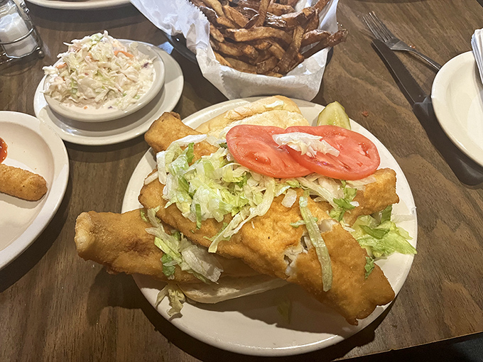 The legendary fish sandwich: a golden-fried behemoth that makes fast food versions look like fish sticks at a kindergarten lunch table.