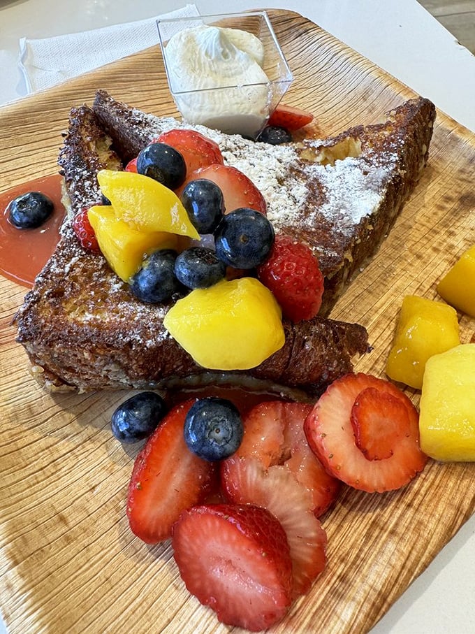 This French toast isn't messing around—it's arrived with a fruit entourage that makes regular breakfast feel like it needs to step up its game.