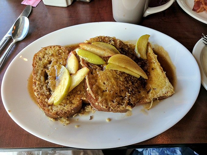 French toast that makes you question why you'd ever eat anything else for breakfast. Those caramelized apples aren't just toppings—they're game changers.