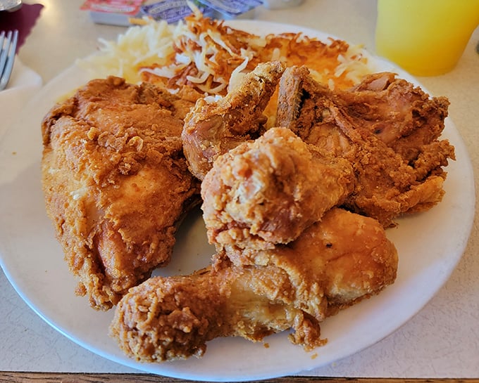 This isn't just fried chicken; it's a masterclass in crispy, golden perfection that would make Colonel Sanders weep with jealousy.