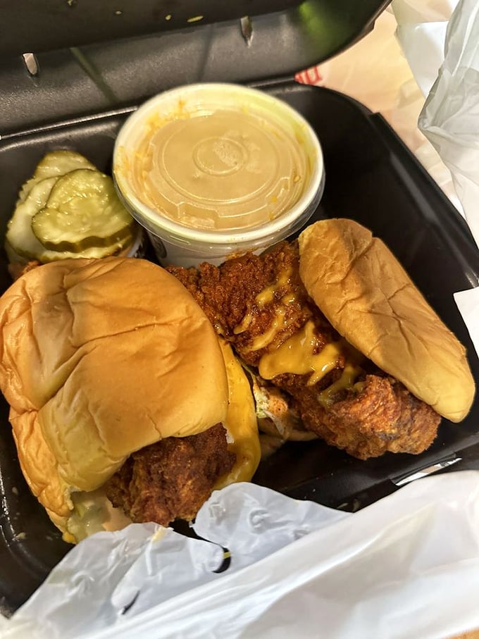 Cheese cascading over crispy chicken between soft buns—it's the sandwich equivalent of hitting the comfort food lottery.