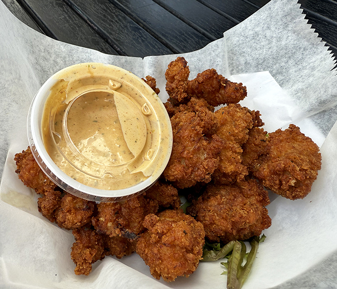 Crispy, tender gator bites—Florida's answer to popcorn chicken. These local delicacies come with a side of bragging rights for the less adventurous friends back home.