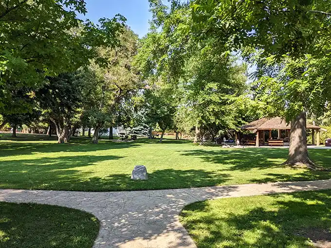 Genoa Town Park – where the grass is always greener, the shade always cooler, and afternoon naps practically mandatory.