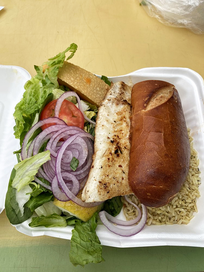 The grilled halibut sandwich – where ocean meets garden in perfect harmony. Proof that sometimes the simplest preparations let truly great ingredients sing their own delicious song.