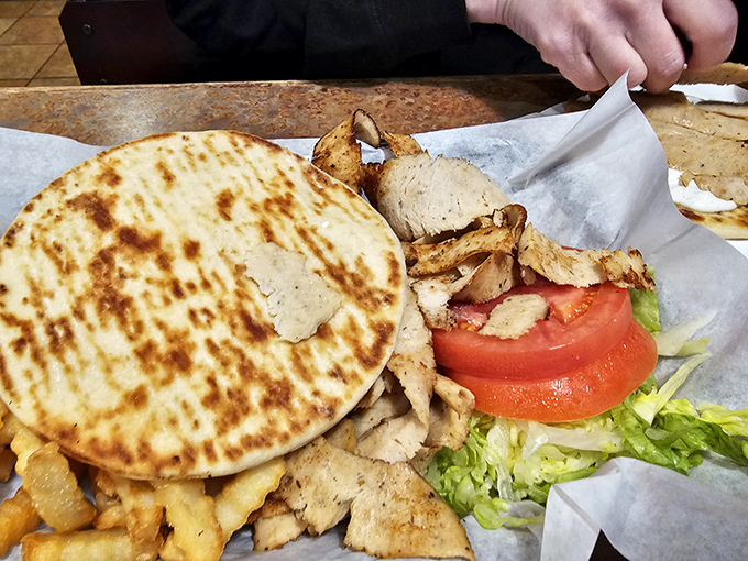 The gyro – where Mediterranean meets Midwest in a handheld testament to cultural harmony that tastes way better than world peace sounds.