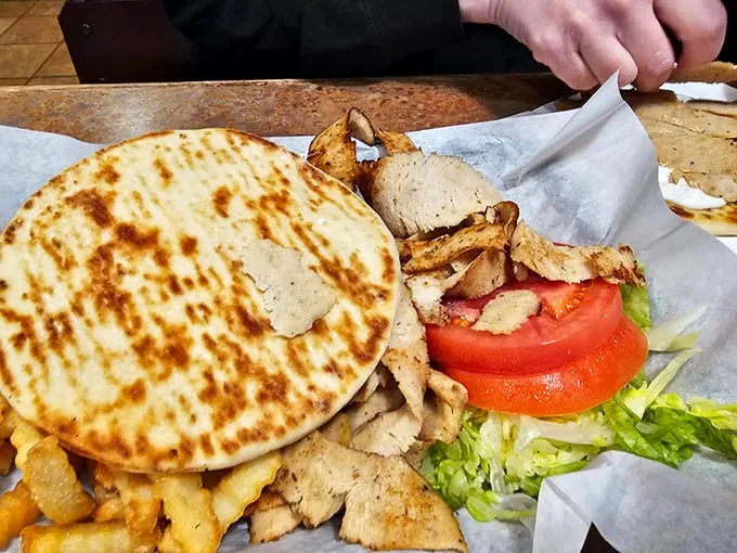 The gyro – where Mediterranean meets Midwest in a handheld testament to cultural harmony that tastes way better than world peace sounds.