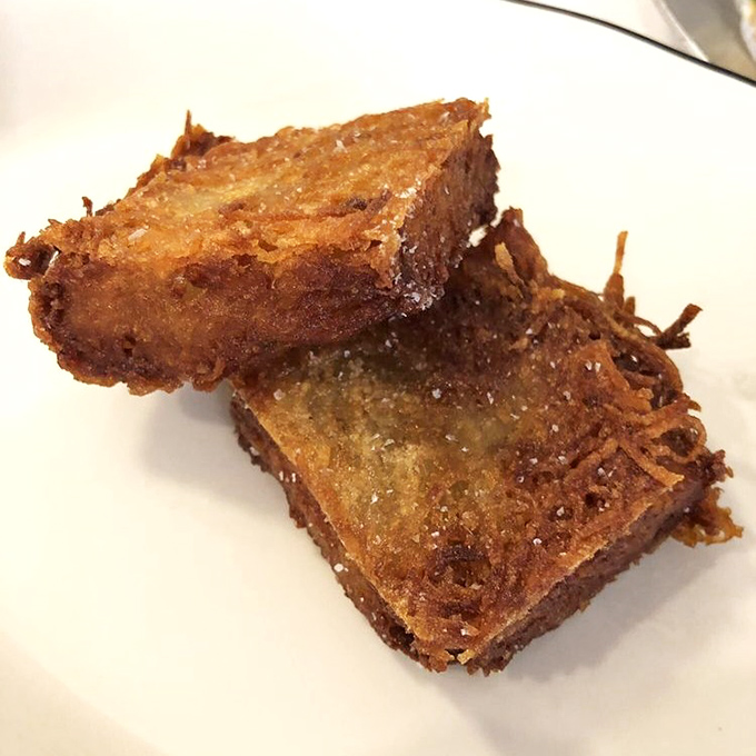 These aren't your average hash browns—they're golden brown perfection squares. Crispy exterior, tender interior, and worth every delicious calorie.
