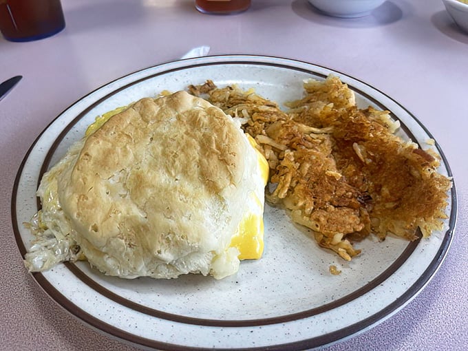 That perfect egg sandwich with crispy hash browns on the side—the breakfast equivalent of finding a parking spot at the beach.