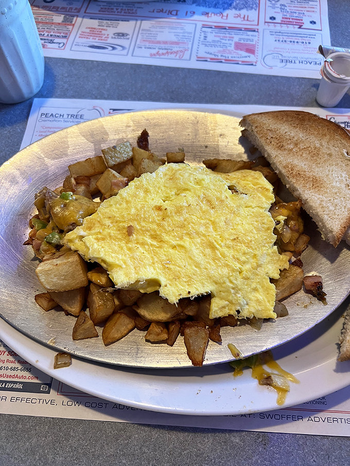 The holy trinity of breakfast: perfectly scrambled eggs, golden home fries, and toast. Simple math that somehow always equals joy.