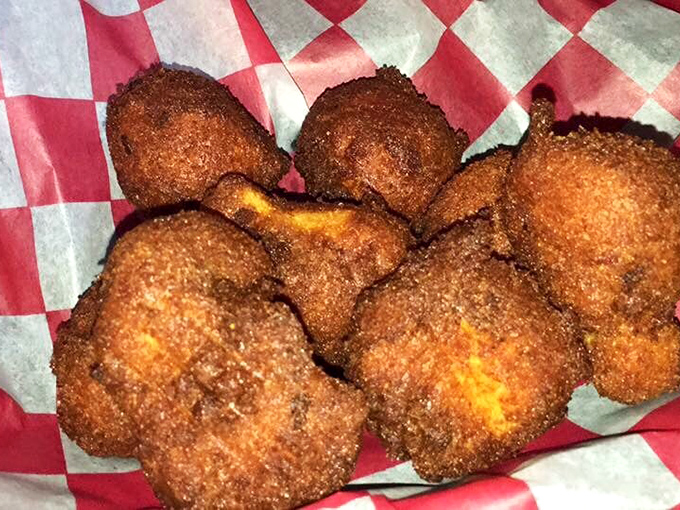 Hush puppies so perfectly golden-brown they deserve their own trophy. Crispy outside, fluffy inside—the unsung heroes of any seafood feast.