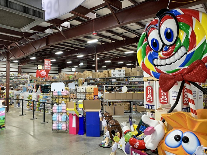 Not just a store—a candy cathedral. That giant lollipop mascot watches over his sugary kingdom with a permanent grin.