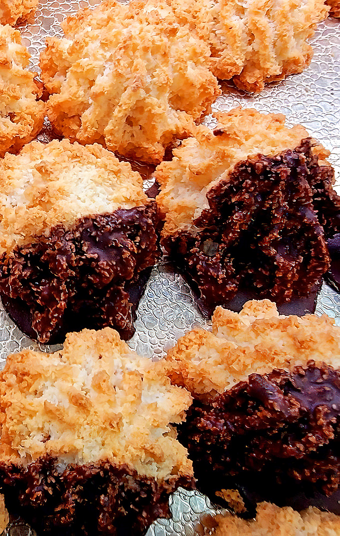 Coconut macaroons dipped in chocolate—proof that sometimes the simplest combinations create the most profound happiness. Half cookie, half religious experience.