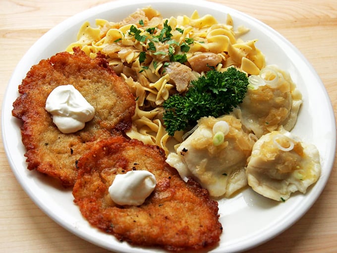 The holy trinity of Polish comfort: crispy potato pancakes, buttery haluski, and plump pierogies. Carb counters, look away—some pleasures are worth every bite.