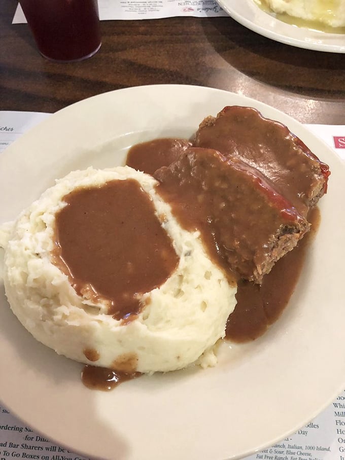 Meatloaf and mashed potatoes swimming in gravy – what diet plans fear and comfort food dreams are made of. Pure Midwest therapy on a plate.