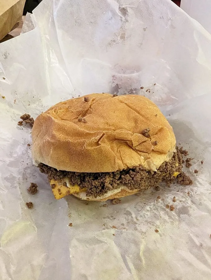 A sandwich that refuses to be contained by its bun – the loose meat rebellion that's converted Midwesterners for generations.
