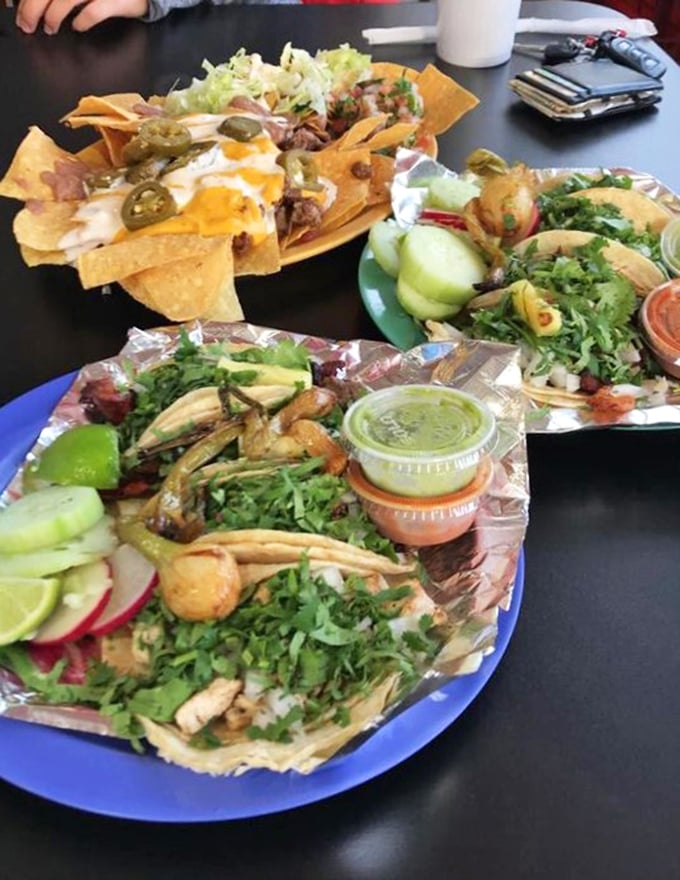 A table spread that makes sharing both necessary and nearly impossible. The tacos are calling, but those nachos won't eat themselves!
