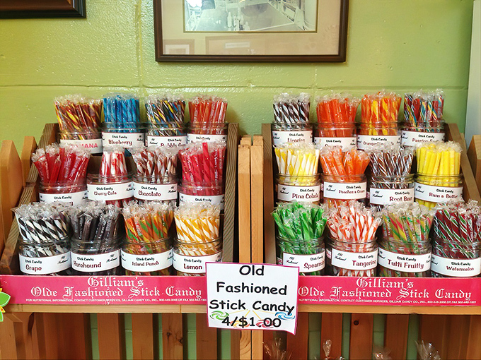 Old-fashioned stick candies arranged like a painter's palette of flavors—from classic peppermint to exotic tangerine and tutti frutti.