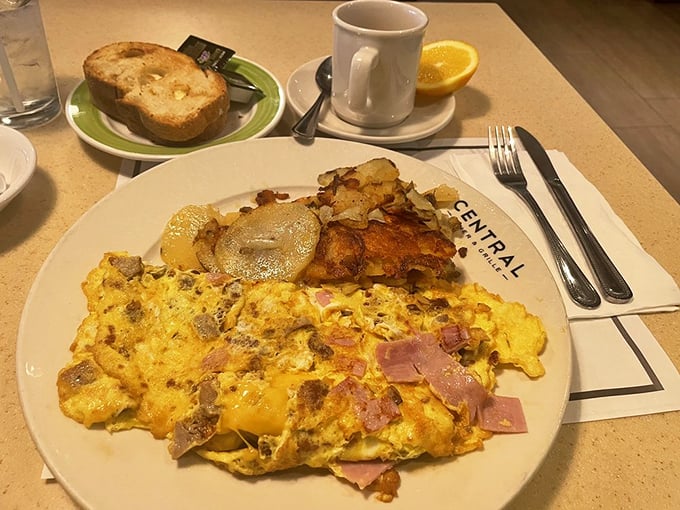 Behold the Western omelet in its natural habitat—perfectly executed, generously filled, and ready to transform your morning from ordinary to extraordinary.